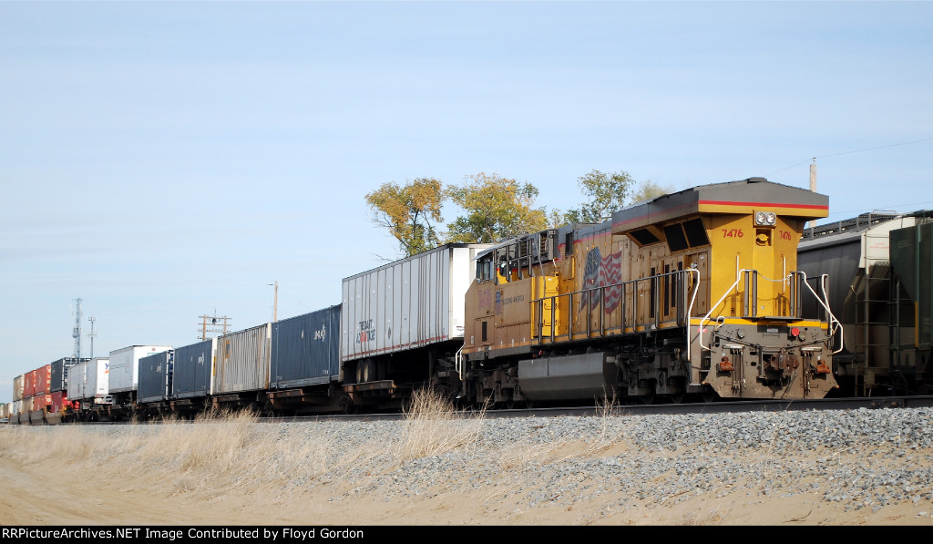 UP 7476 pushes on a west bound intermodal